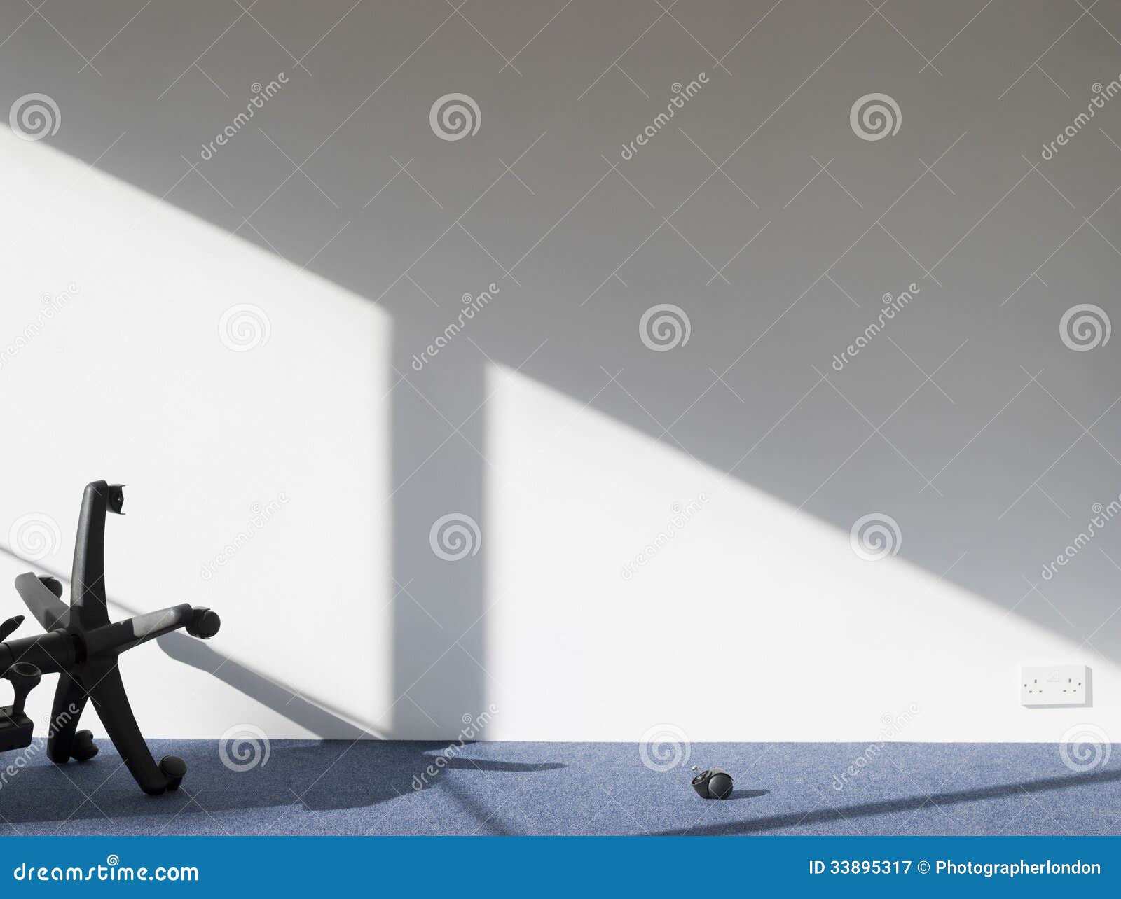 Broken Office Chair Casting Shadow on Wall Stock Image - Image of ...