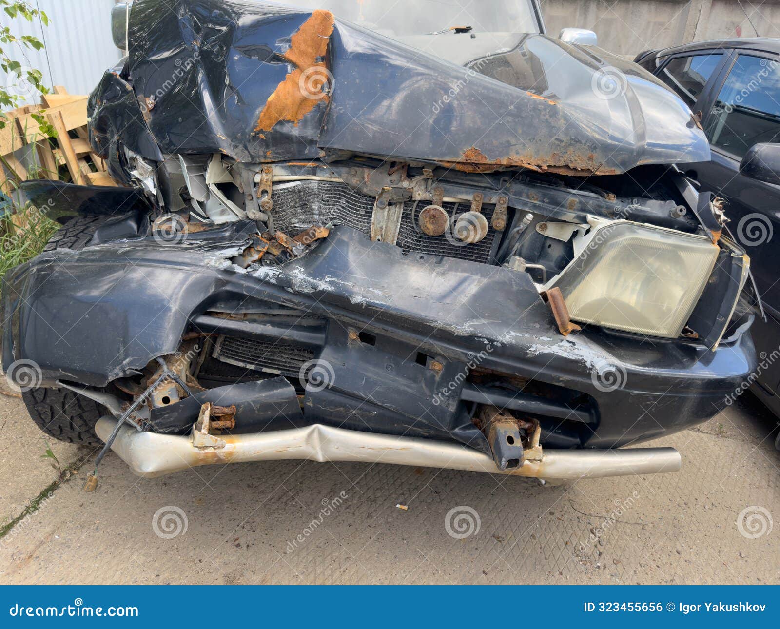 A Broken Passenger Car with Rust, Close-up, Standing Outside Stock ...