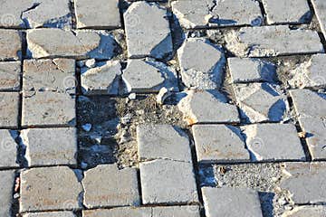 Broken pavement tile stock photo. Image of masonry, stone - 324063386