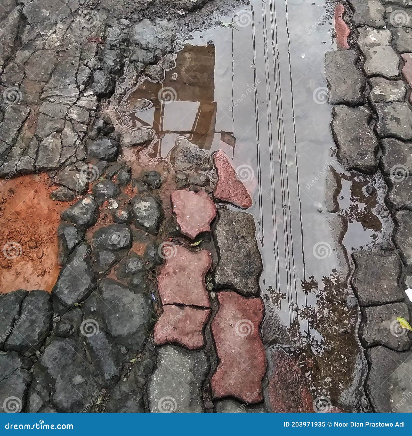 Broken paving roads stock image. Image of brick, leaf - 203971935