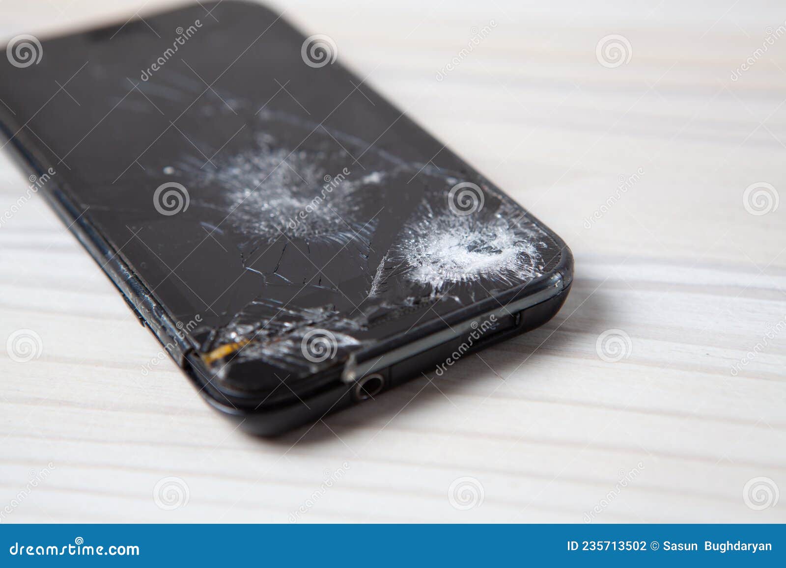 Broken phone on the table stock photo. Image of technology - 235713502