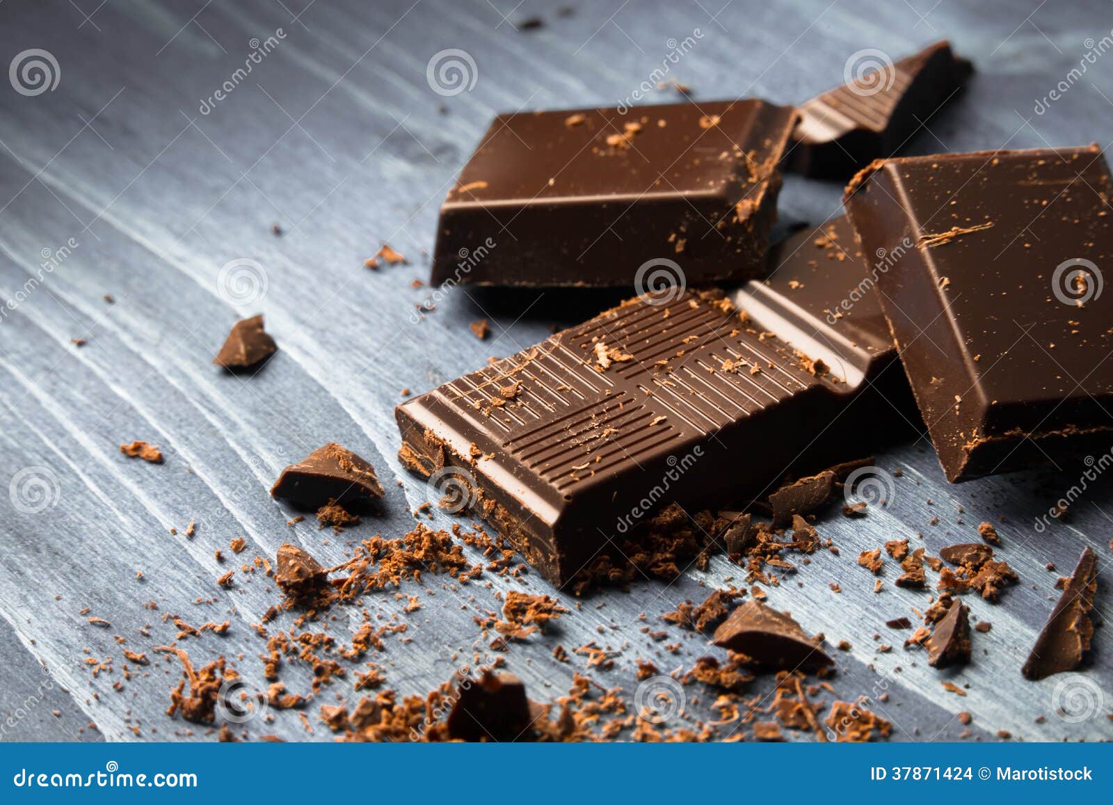 Broken pieces of chocolate stock photo. Image of carbohydrates - 37871424
