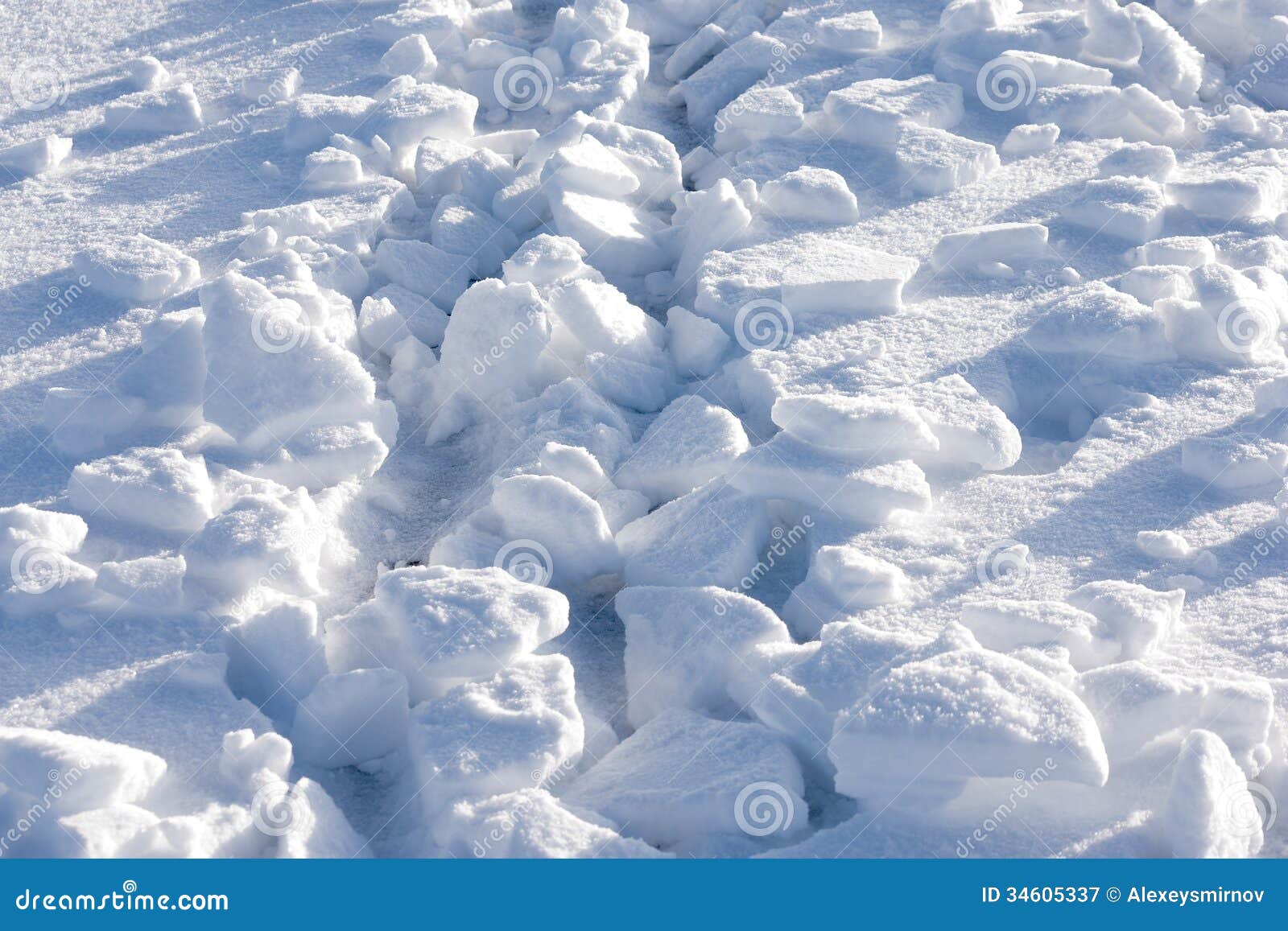 Broken pieces of snow stock image. Image of heap, scattered - 34605337