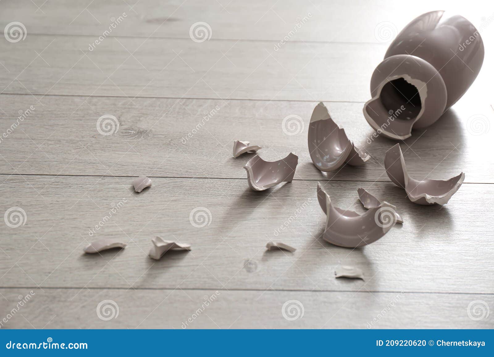 Broken Pink Ceramic Vase on Wooden Floor Stock Photo - Image of ...