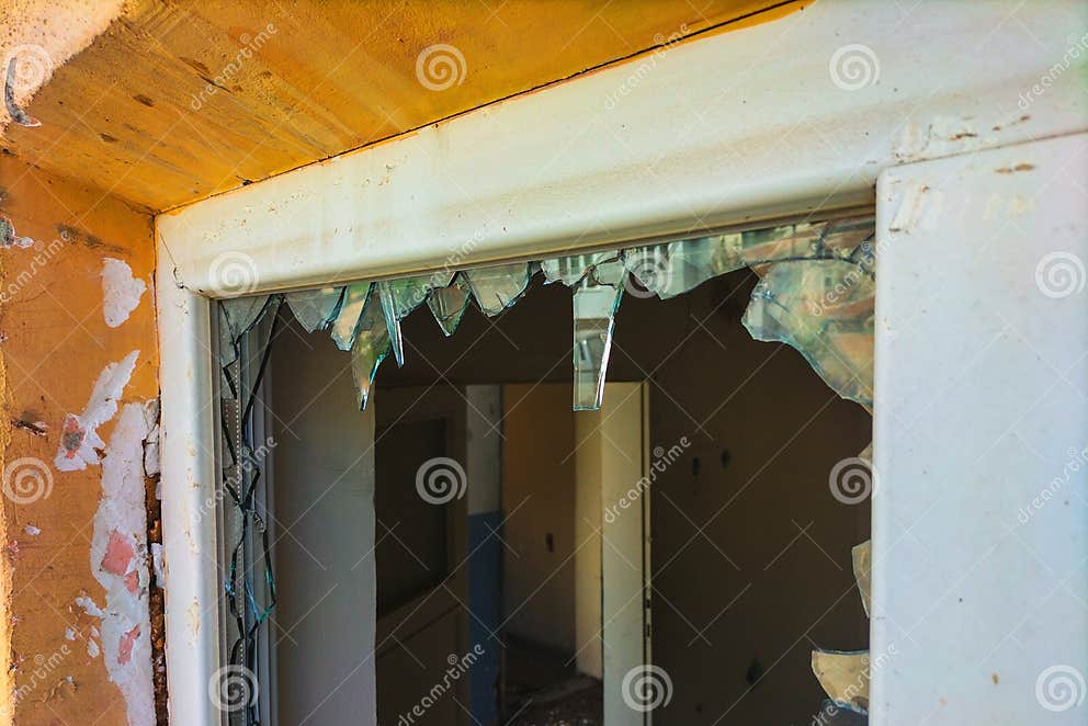 A Broken Plastic Window with the Remaining Fragments through Which ...