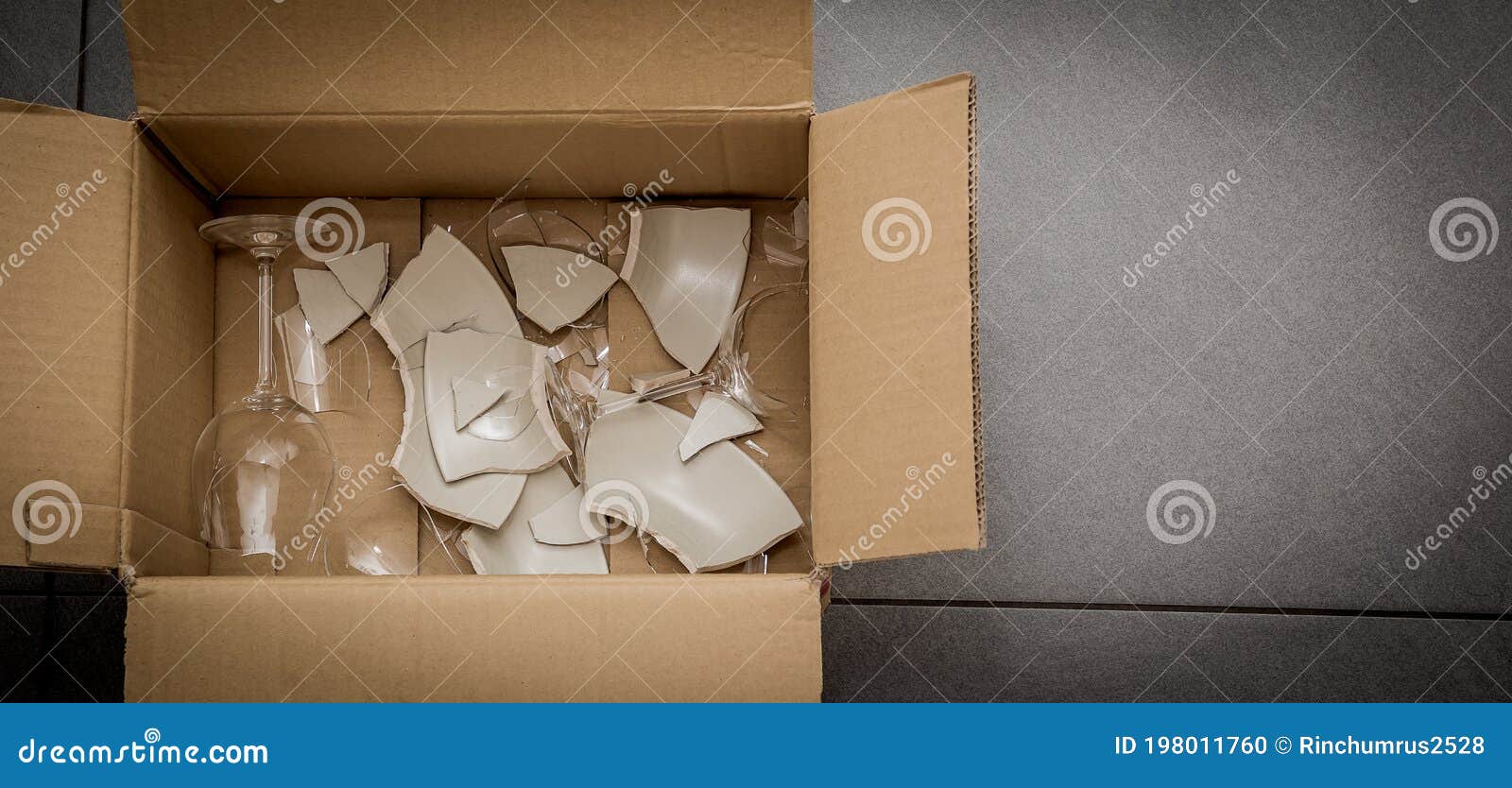 Broken Plates or Broken Glass Put in Box in the Kitchen. the Concept of ...