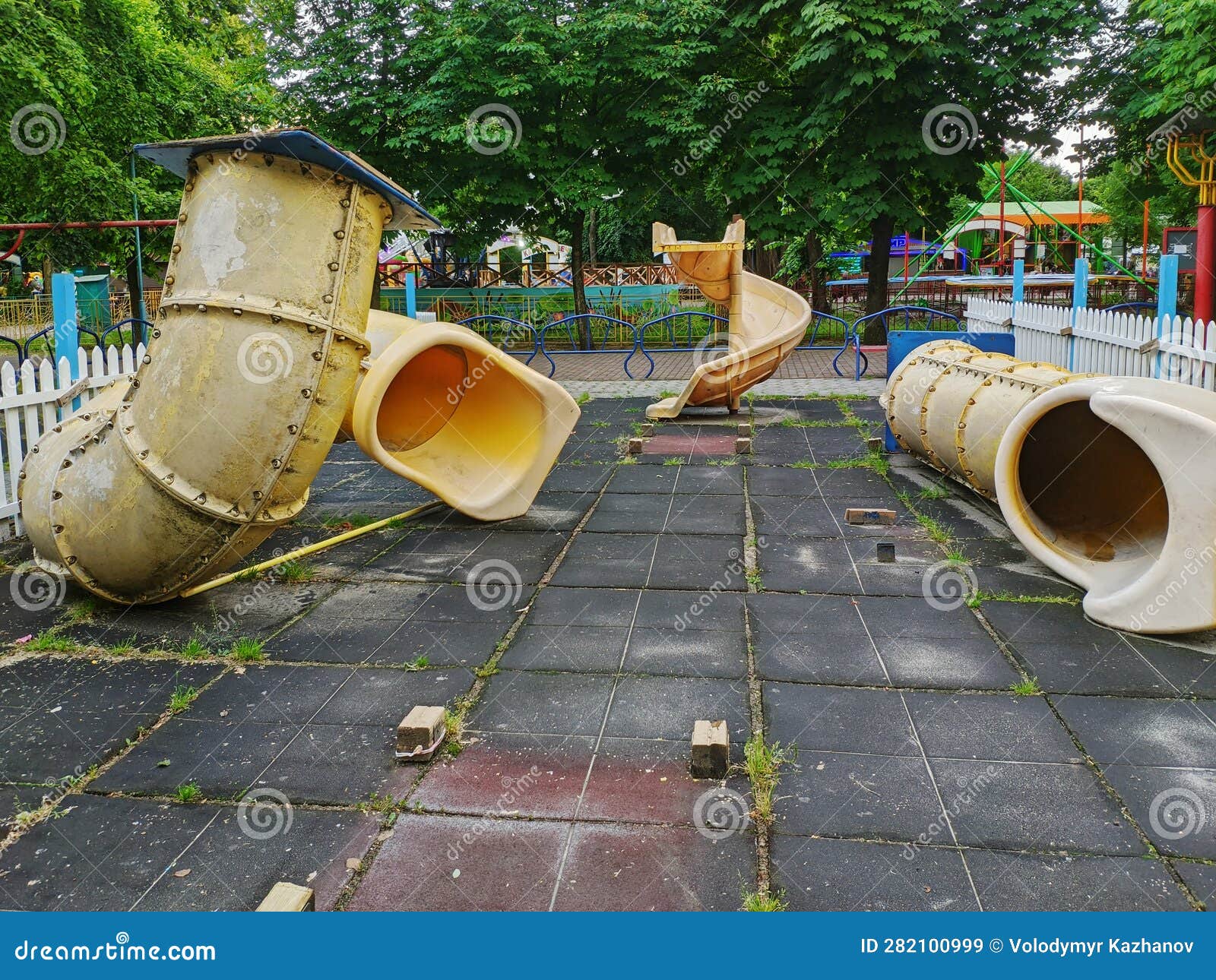 Broken Playground with Slides in an Amusement Park on a Summer Day ...