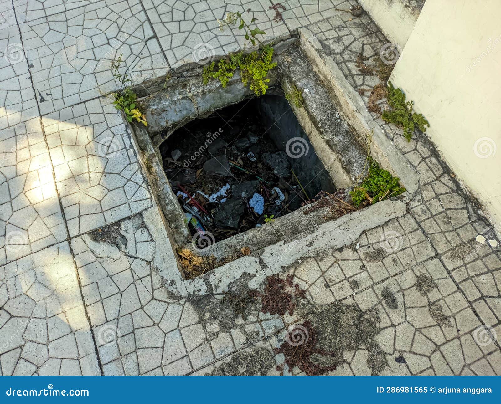 A Broken and Pothole Pavement Stock Image - Image of concrete, cracked ...
