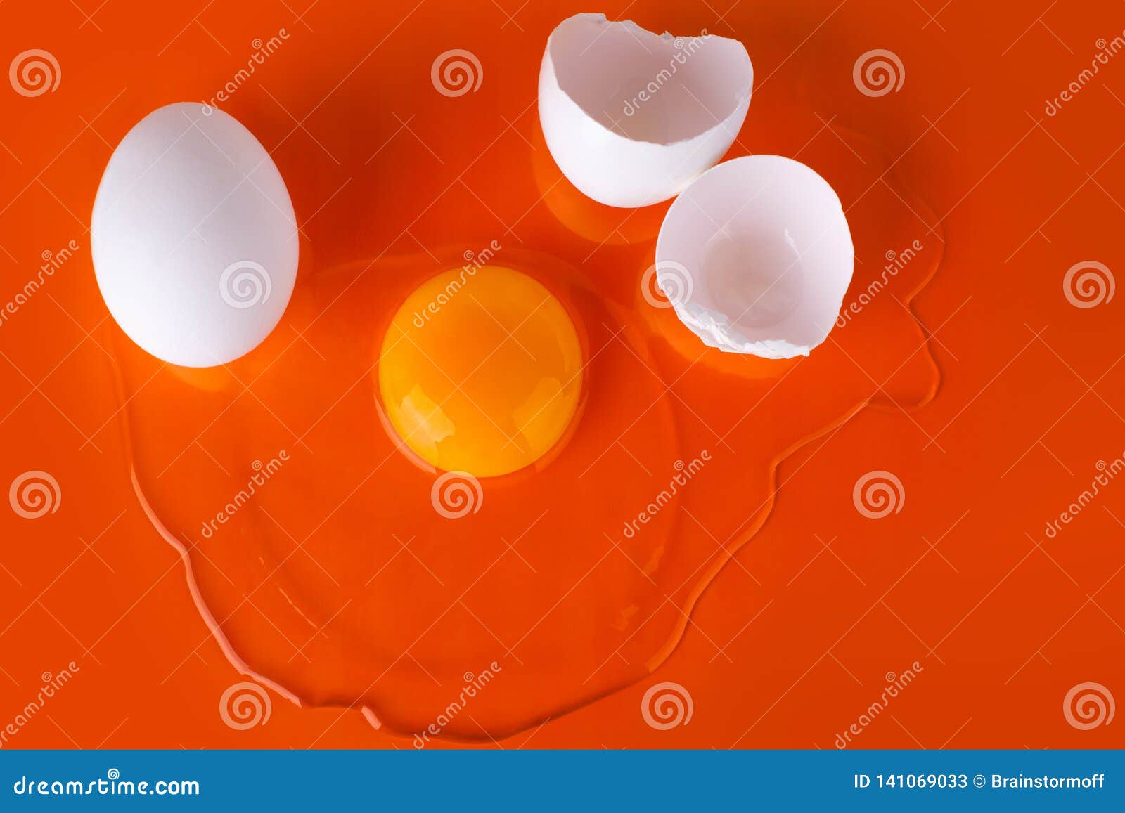 Broken Raw Egg, Eggshell and Whole White Egg on Bright Orange ...