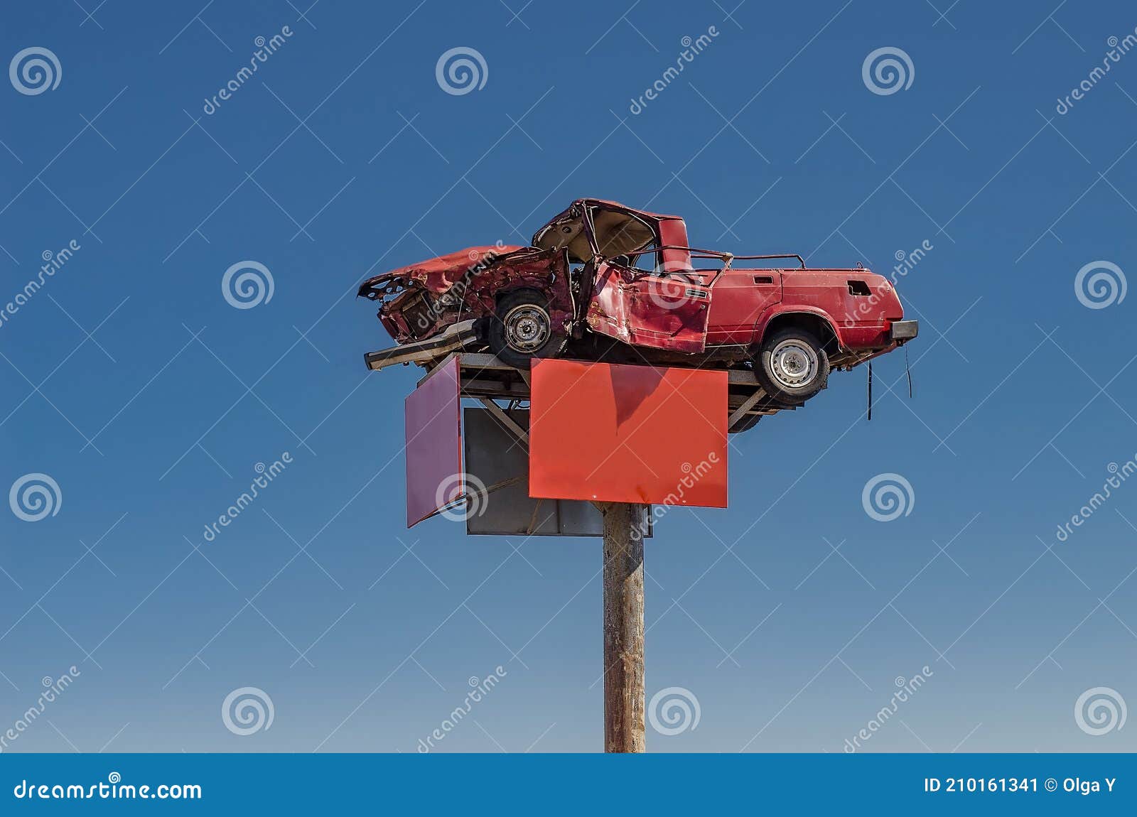 Broken Red Car on an Advertising Pole, Blue Sky Background Stock Image ...
