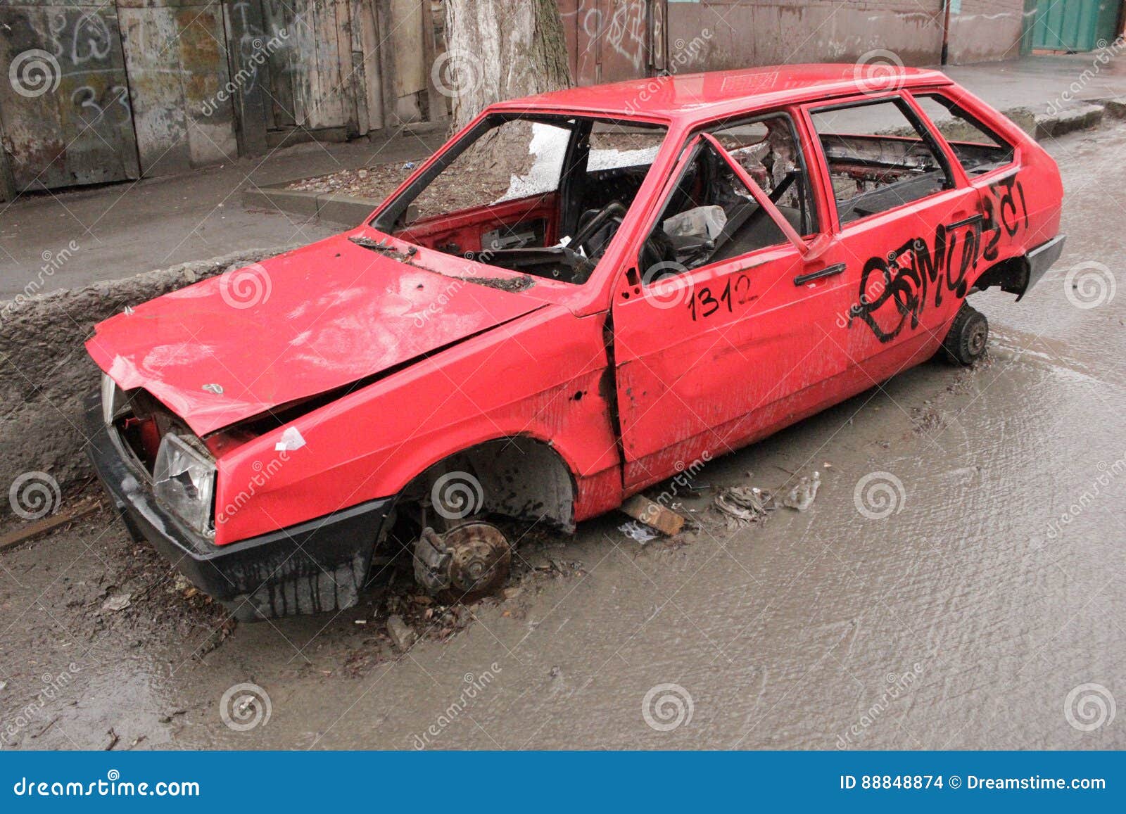Damaged Red Car