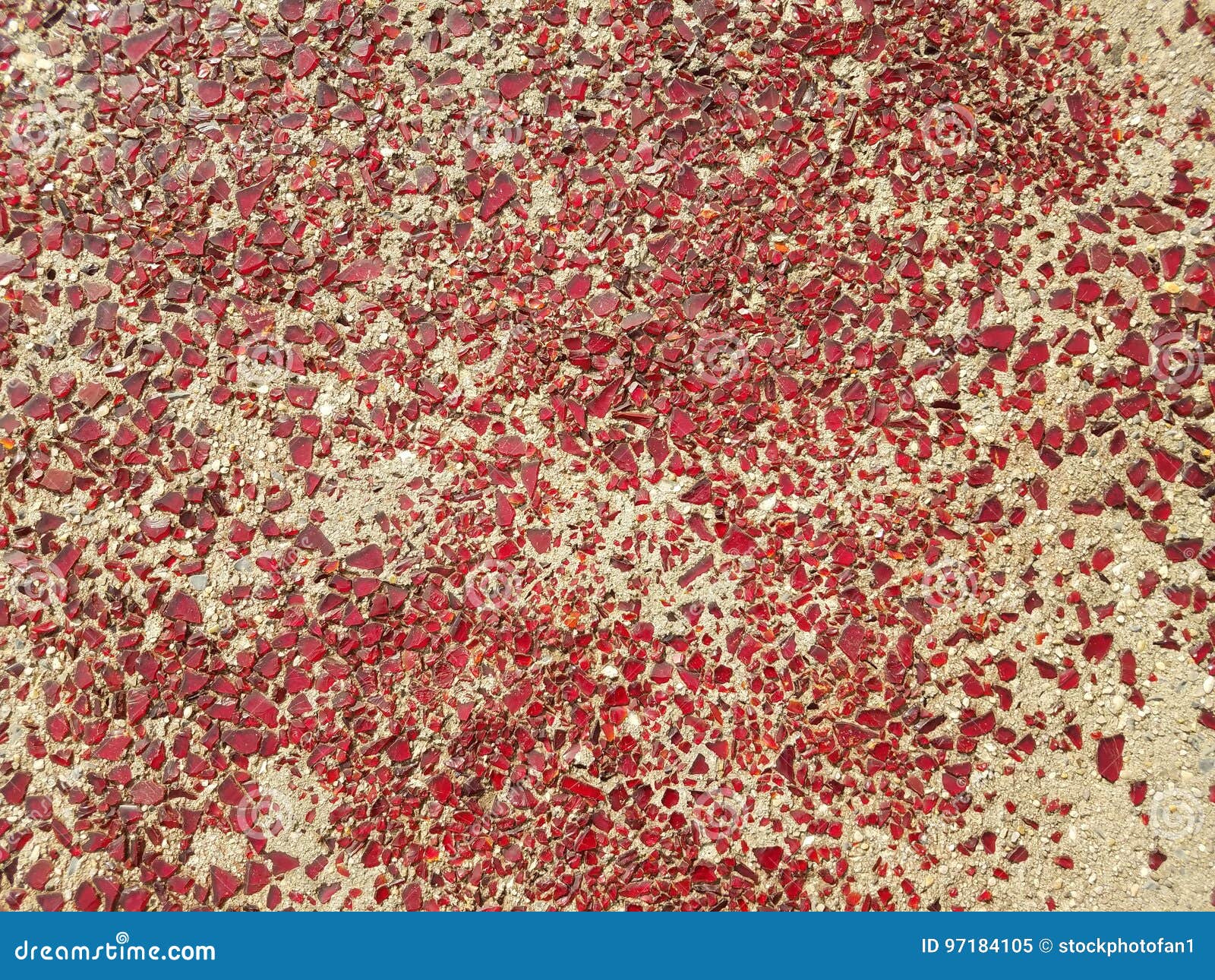 Broken red glass in cement stock image. Image of embedded - 97184105
