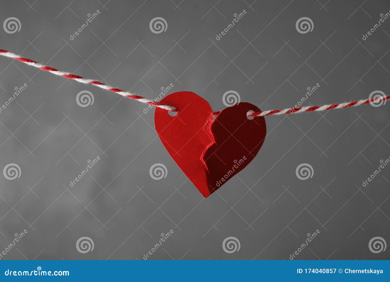 Broken Red Paper Heart on Rope Against Background. Relationship ...