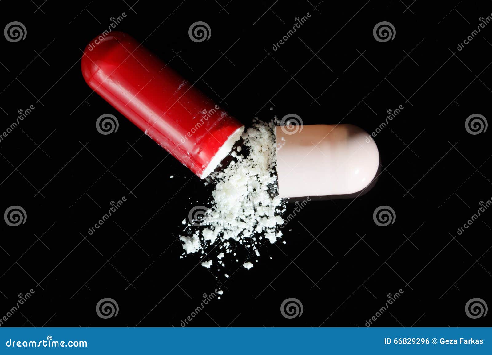 Broken Red and Pink Antibiotic Capsule on Black Stock Photo - Image of ...