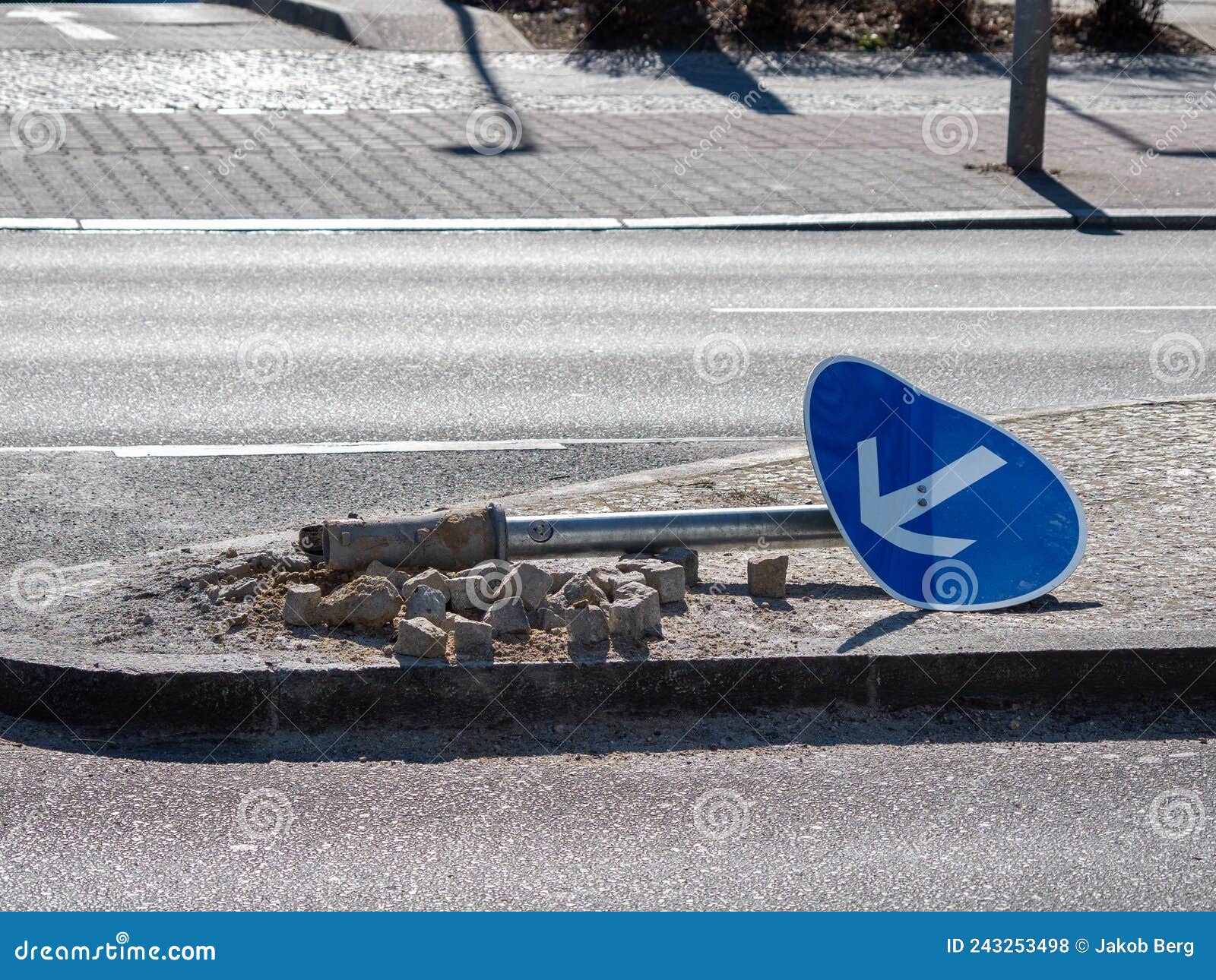Broken Road Sign. Road Sign Lies on the Road. Stock Photo - Image of ...