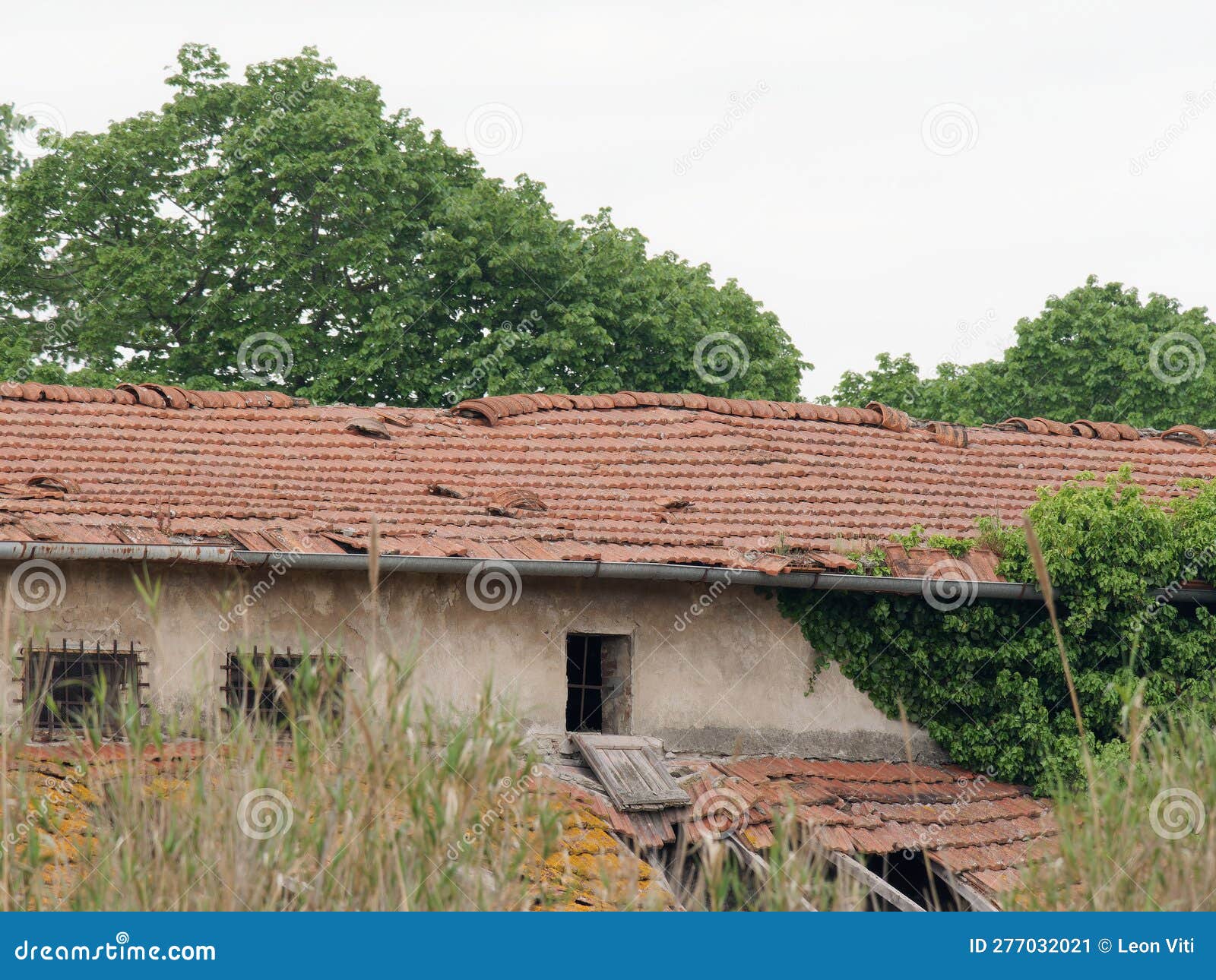 Broken roof after a storm stock image. Image of crack - 277032021