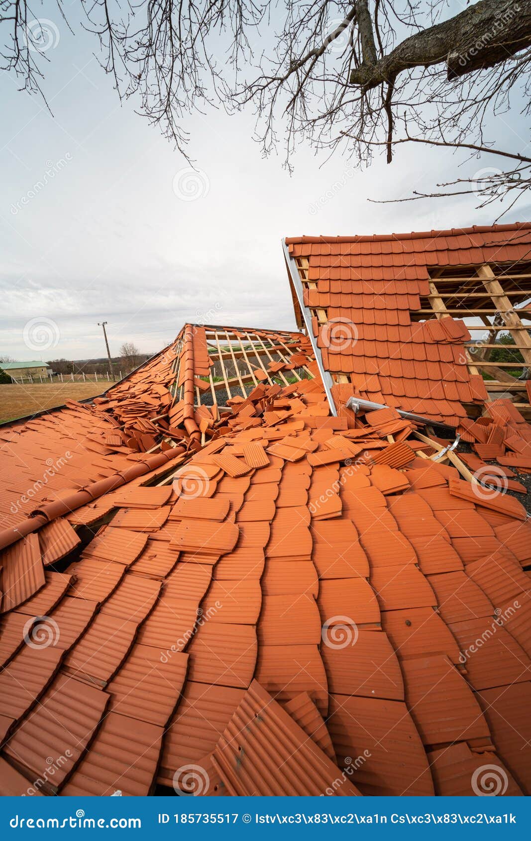 Broken roof after a storm stock image. Image of demolition - 185735517