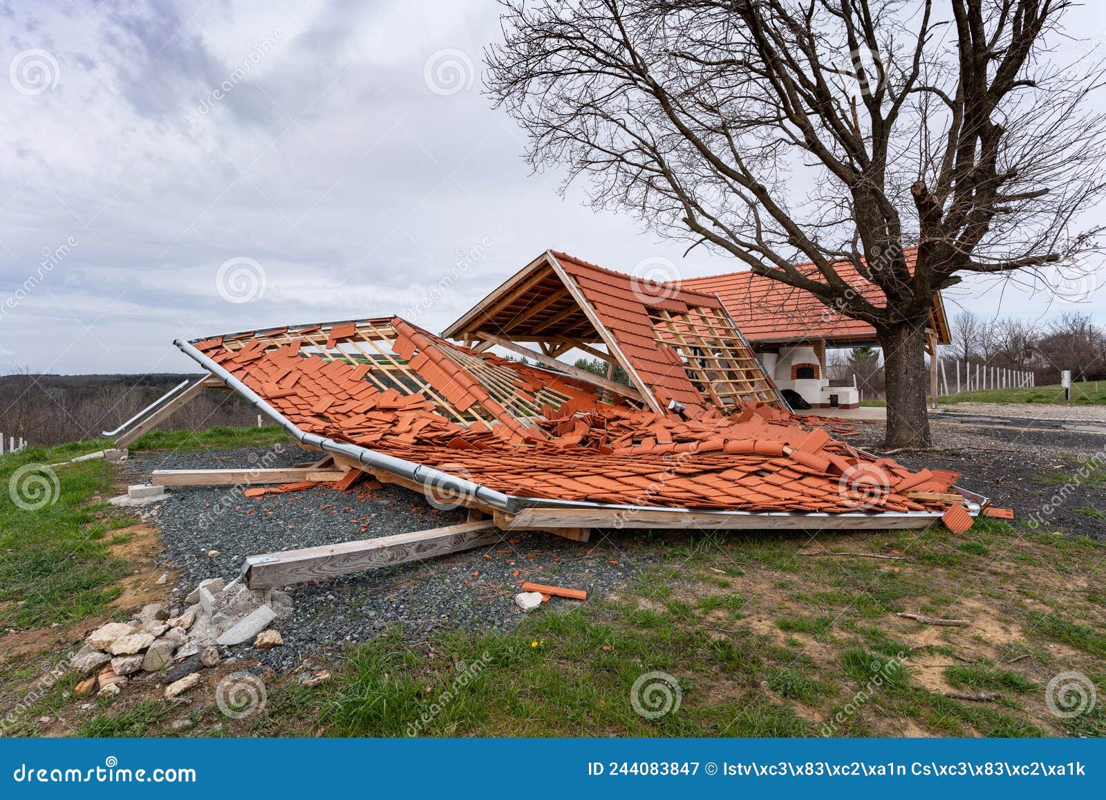 Broken roof after a storm stock image. Image of collapsed - 244083847
