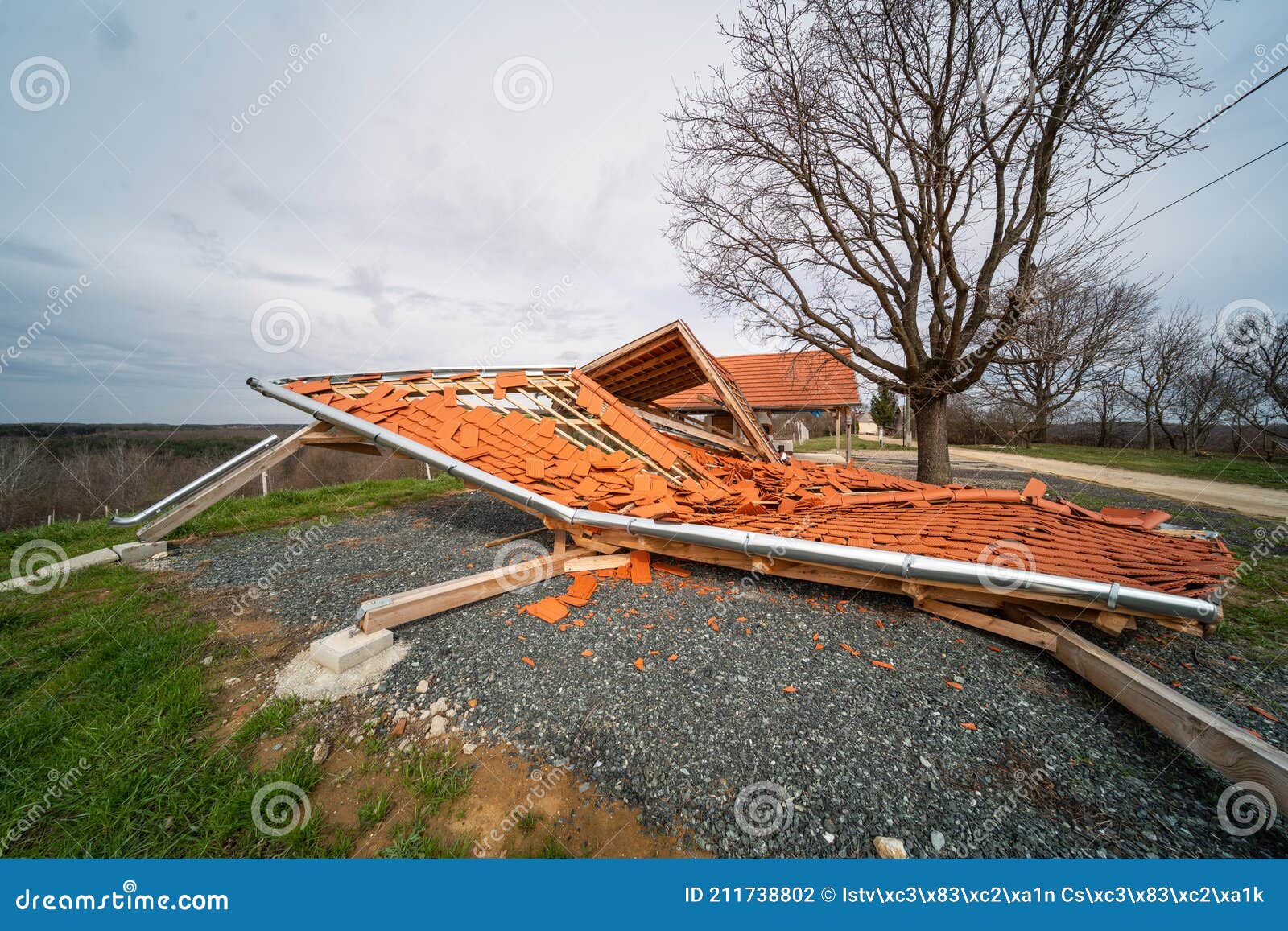 Broken roof after a storm stock photo. Image of break - 211738802
