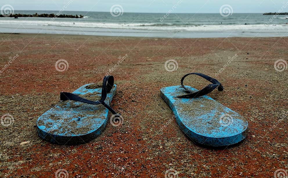 Broken Sandals on the Beach Stock Photo - Image of sandals, lonely ...