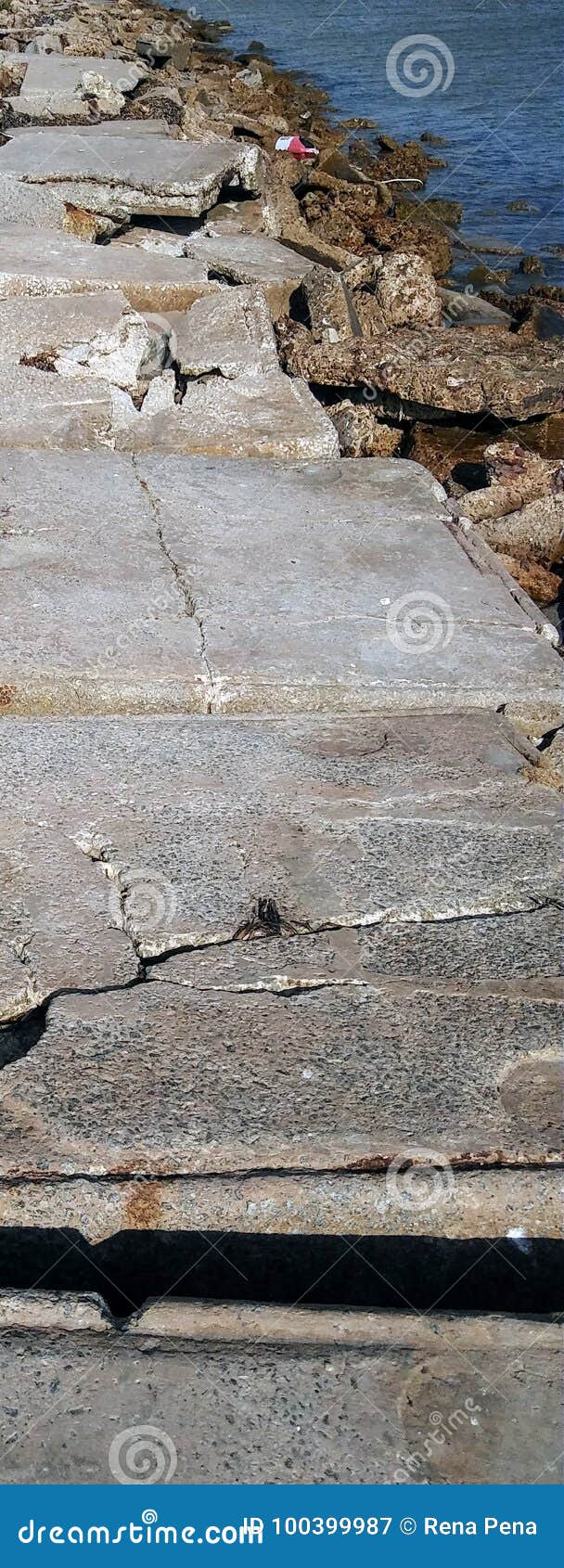 Broken ocean path stock image. Image of seawall, path - 100399987