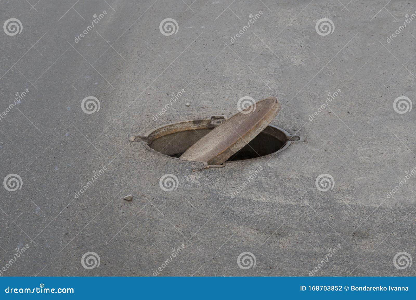 Broken Sewer Manhole Cover Dangerously Open in the Middle of the Road ...
