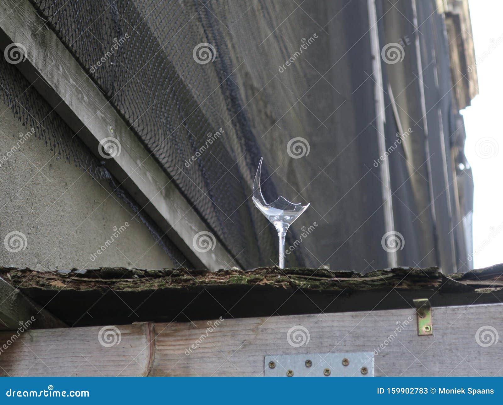Broken Sharp Wine Glass Standing on an Old Wooden Roof Stock Image ...