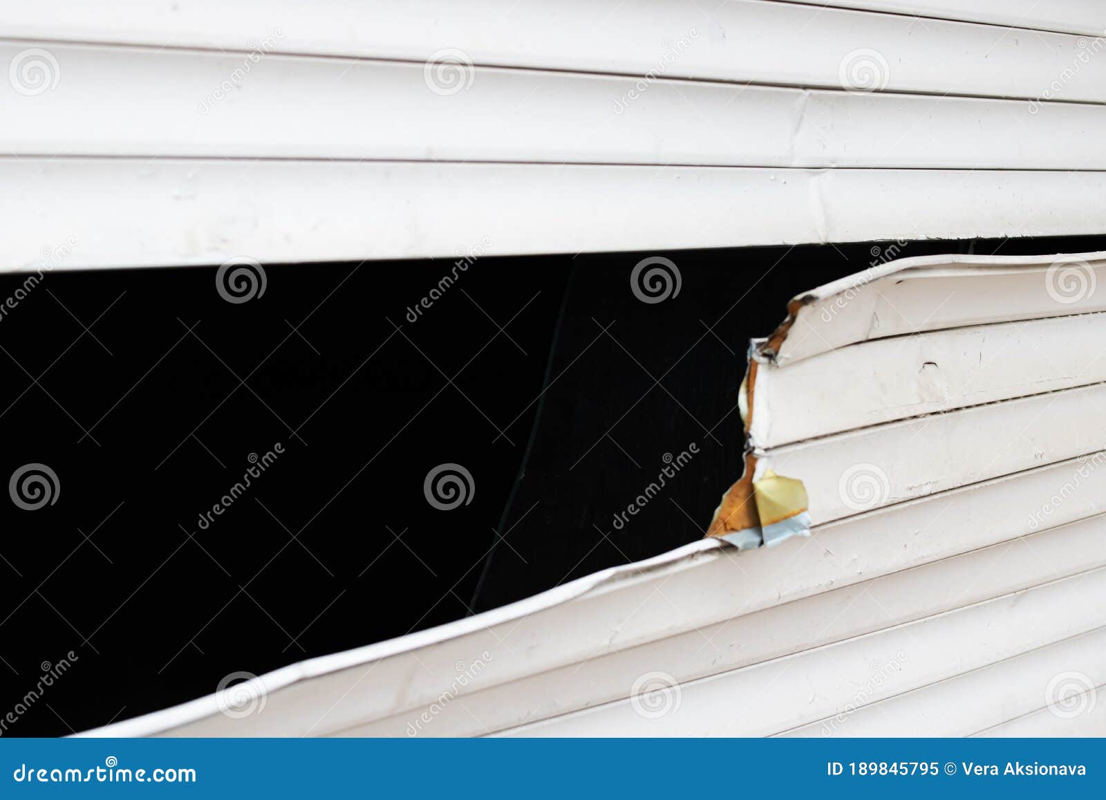 Broken Shutters on a Roller Shutter Window Stock Image - Image of ...