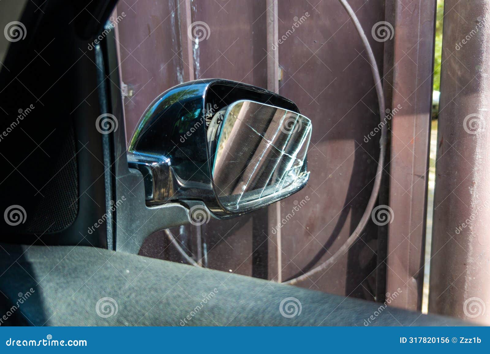 Broken Side Window of Black Car in Rusted Gate Background, View from ...