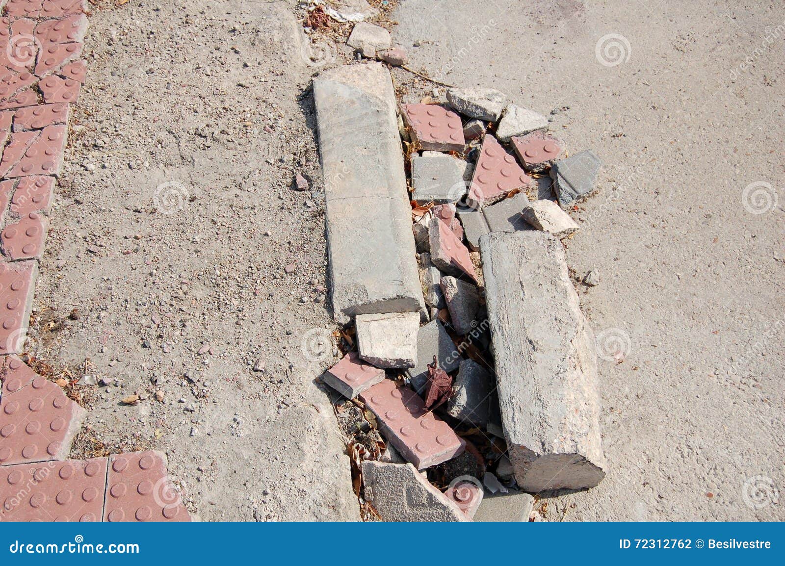 Broken Sidewalk Curb With Exposed Rebar And Jagged Edges That Could ...