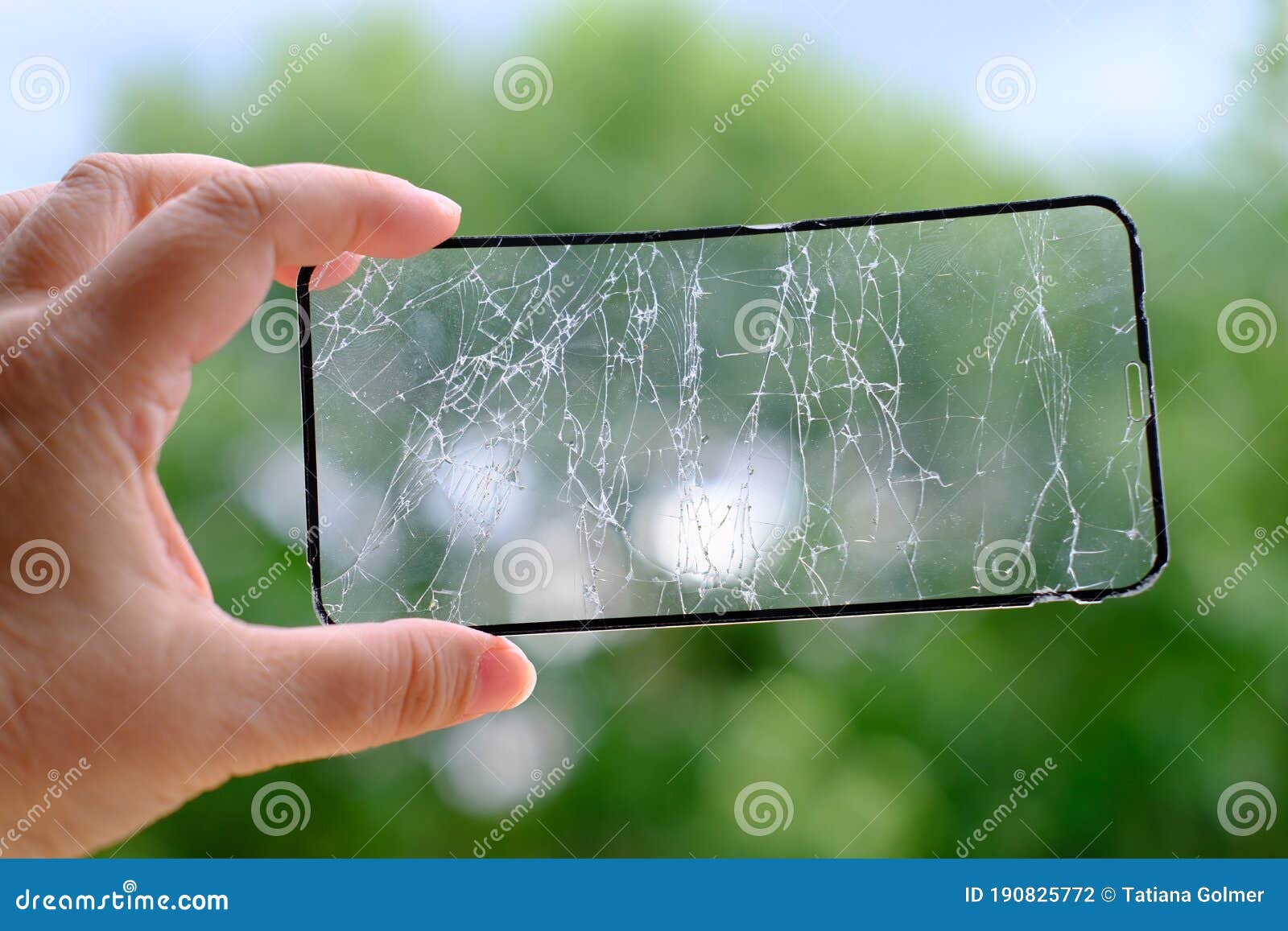 Broken into Small Cracks Protective Glass Screen from a Modern Mobile ...