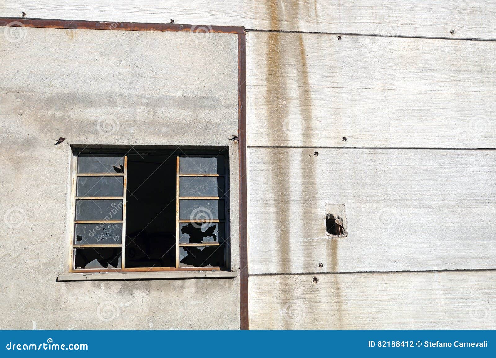 Broken Stained Window Surface of a Partially Demolished Factory. Stock ...
