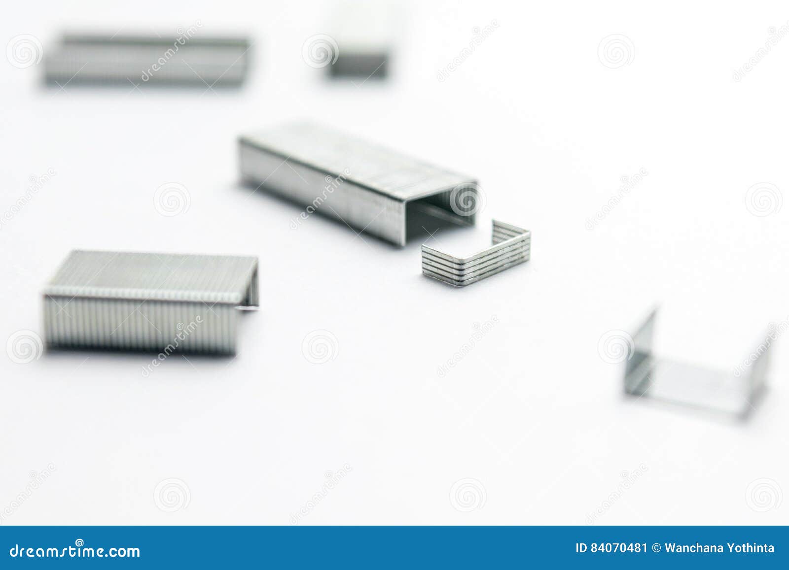 Broken staples on paper stock image. Image of abstract - 84070481