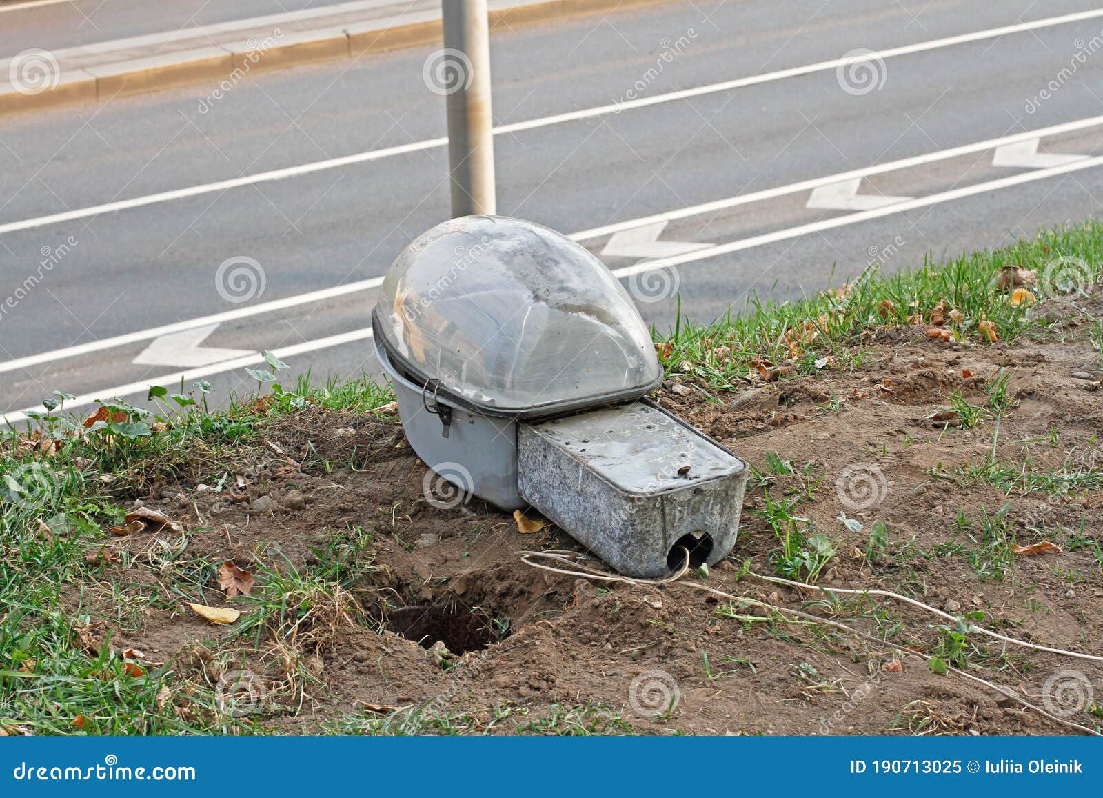 Broken Street Lamp Lying on the Green Grass Stock Image - Image of ...