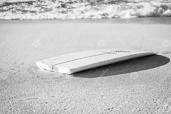 A Broken Surfboard at the Beach Stock Photo - Image of extreme, sand ...