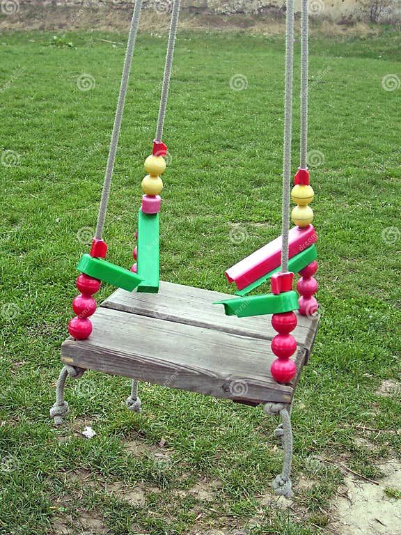 A Broken Swing stock photo. Image of grass, shuggy, play - 3398048