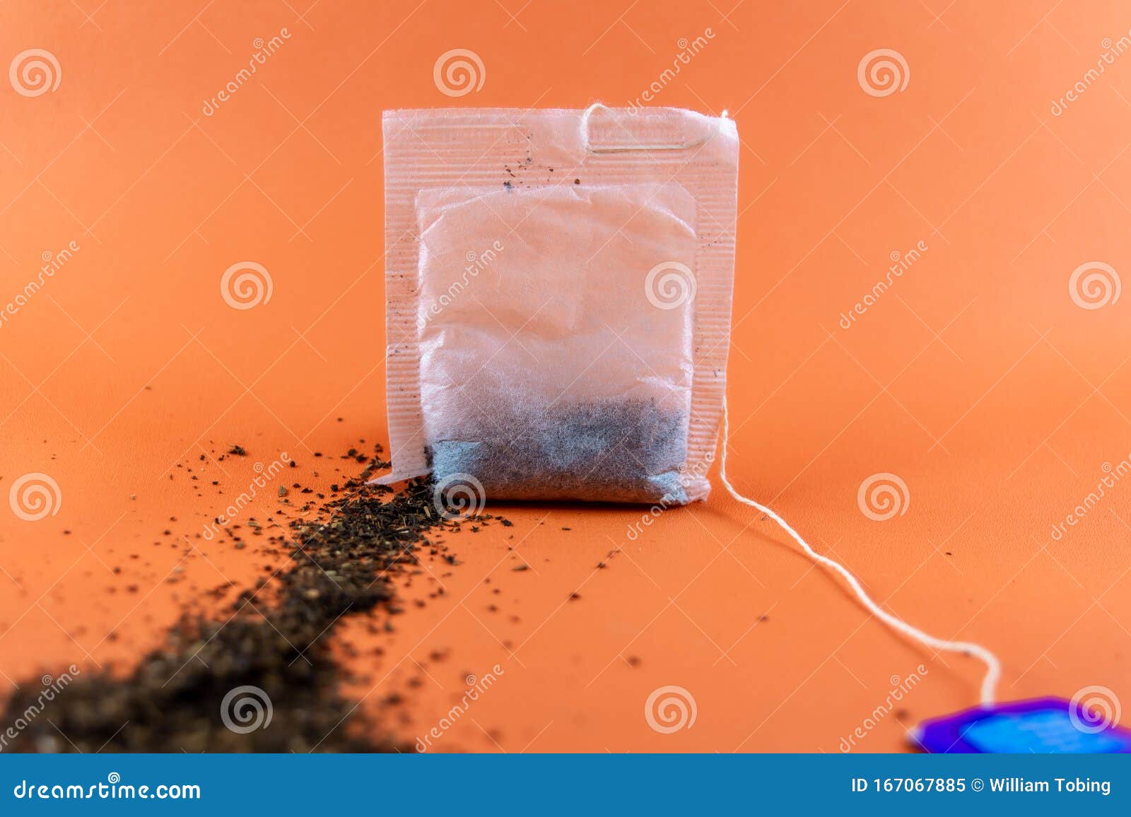 Broken Tea Bag with Orange Background Stock Image - Image of orange ...