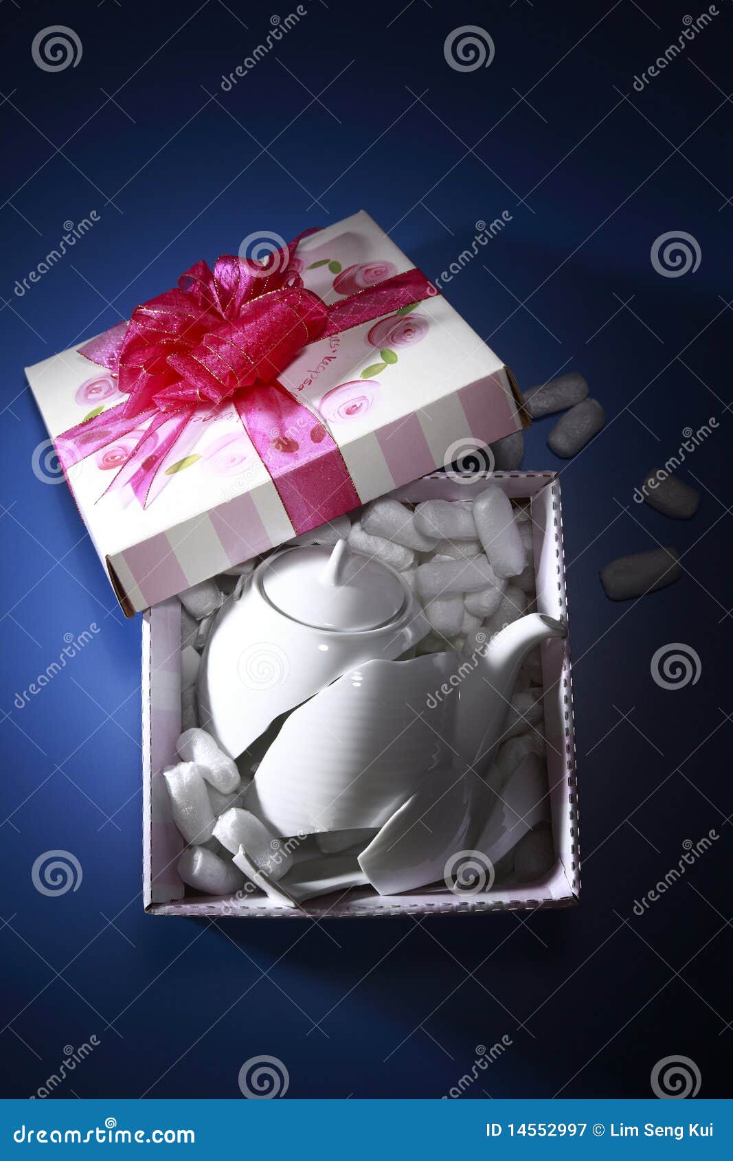 Broken tea pot stock image. Image of protected, parcel - 14552997