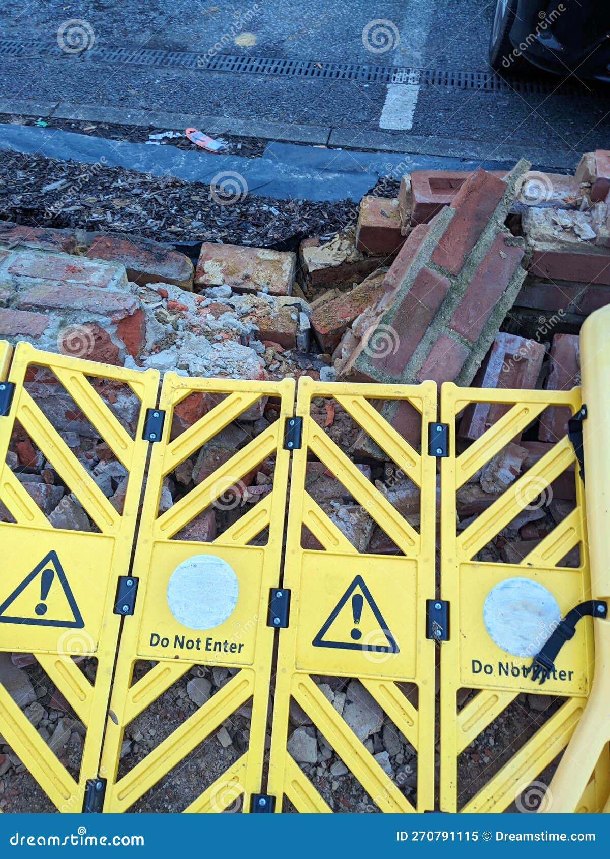 Broken Wall in a Carpark Been Hit by a Car with Warning Barrier Around ...