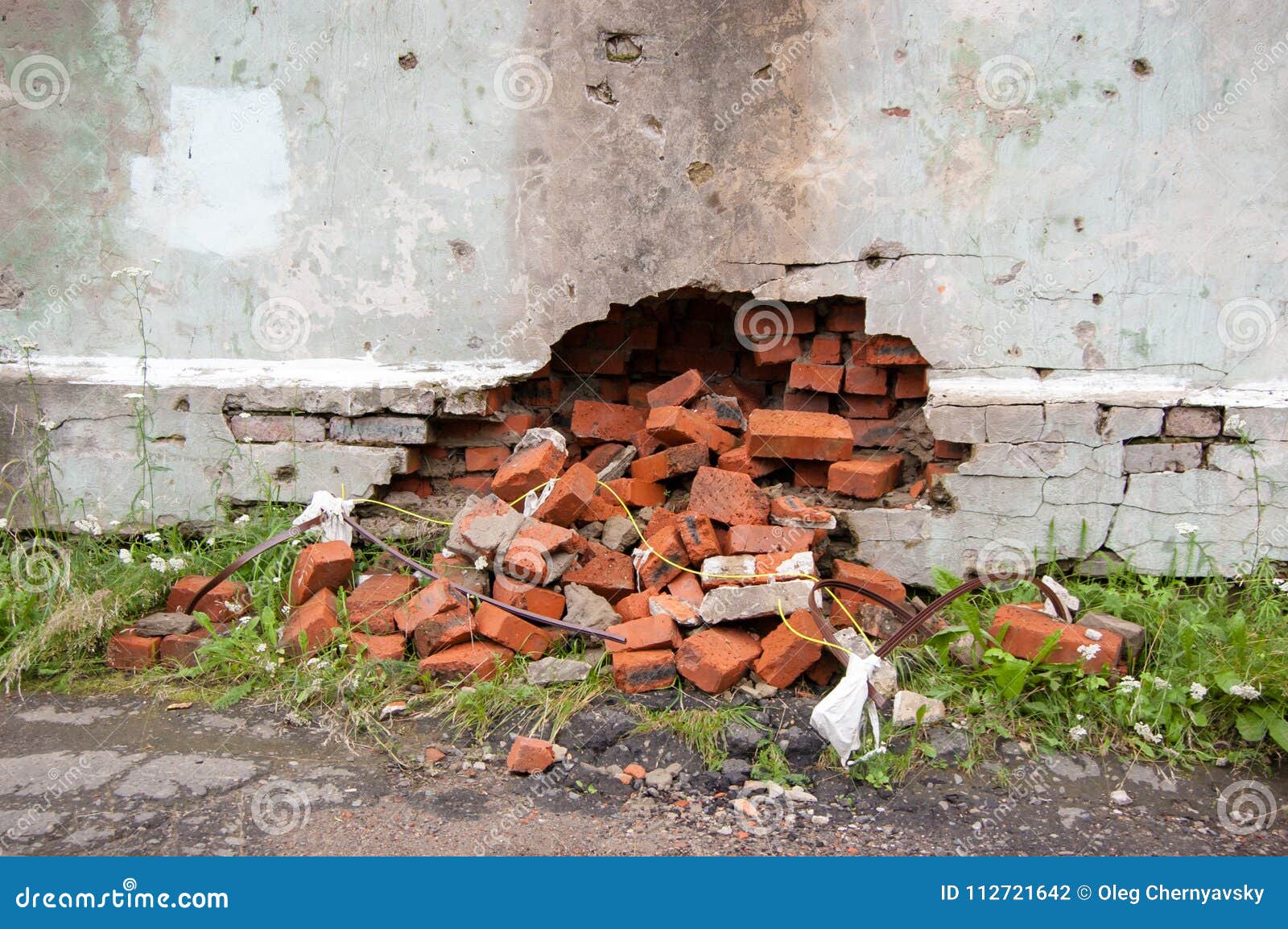 A Broken Wall from Which the Bricks Fell Out Stock Photo - Image of ...