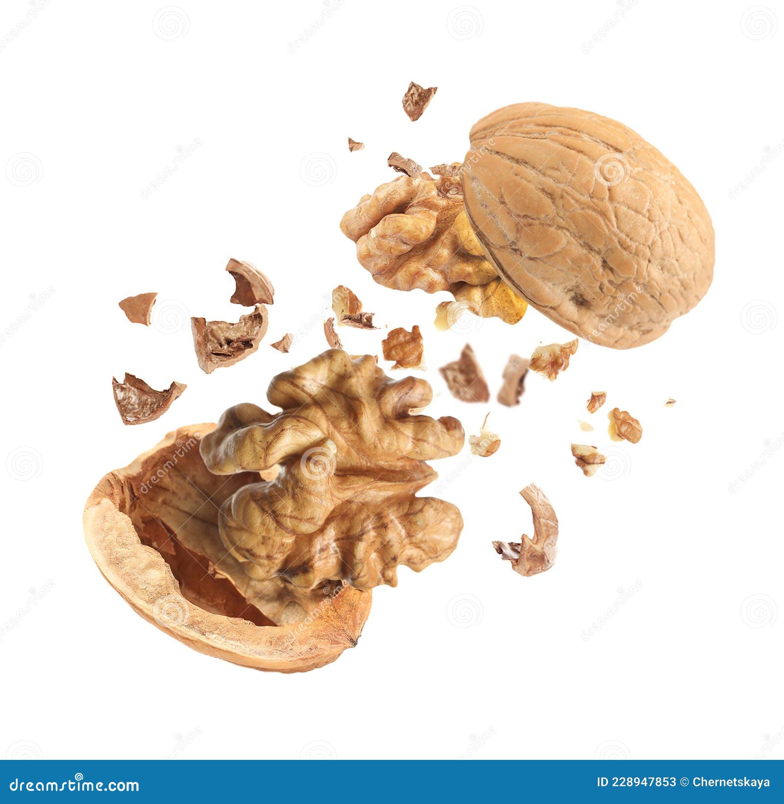 Broken Walnut and Pieces of Shell Flying on White Background Stock ...
