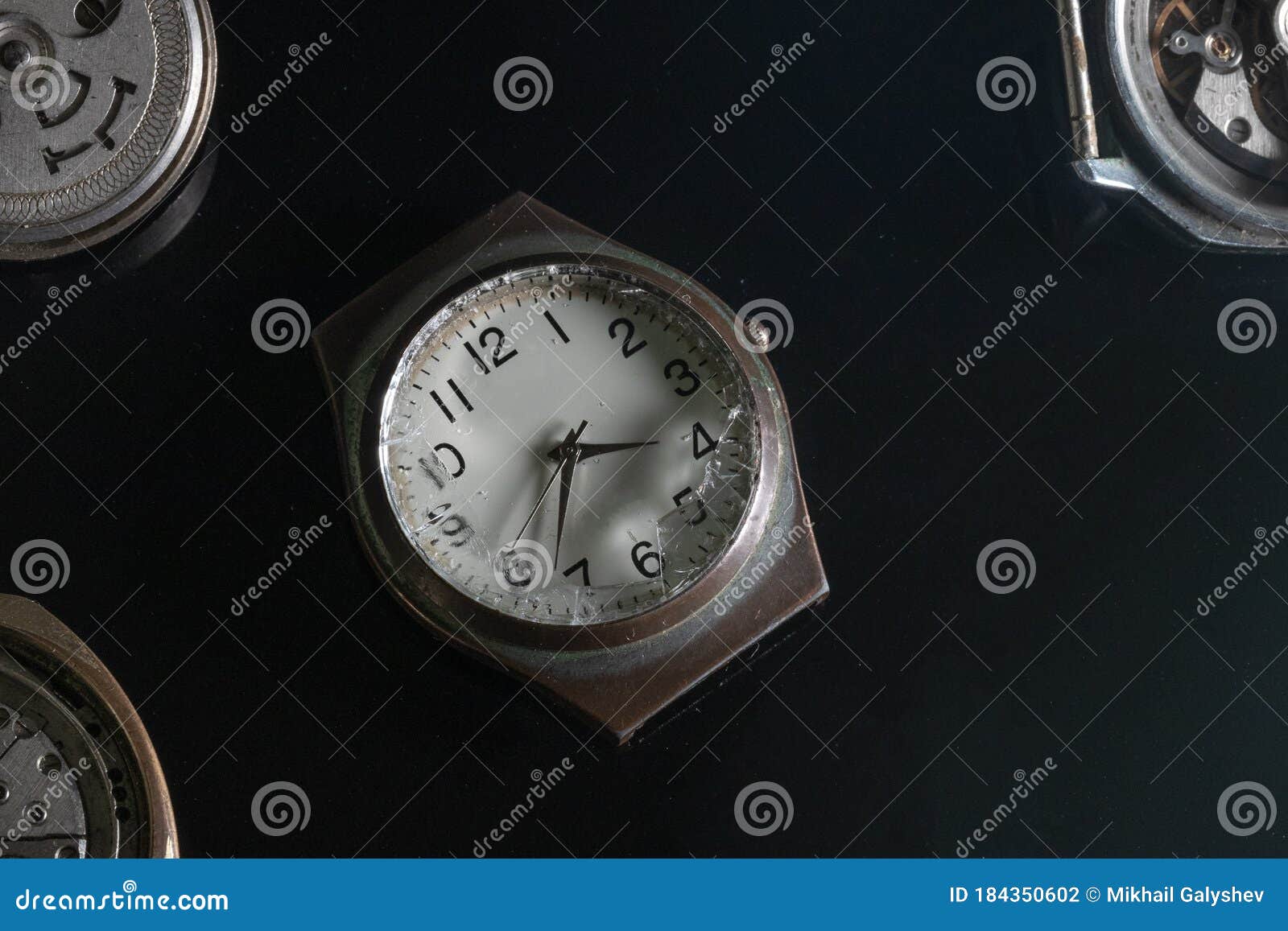 Broken Watch Close-up on a Black Background. Stock Photo - Image of ...