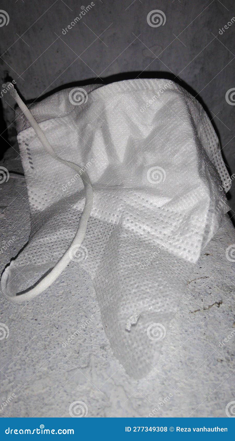 A broken white mask stock photo. Image of flooring, coronavirus - 277349308