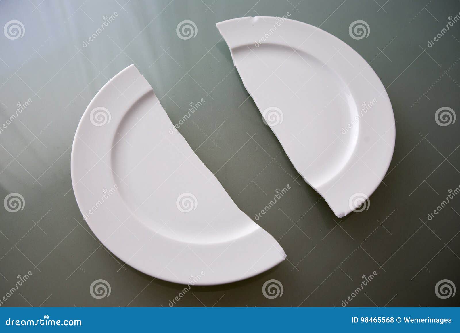 Broken White Plate on Glass Table Stock Photo - Image of fallen ...