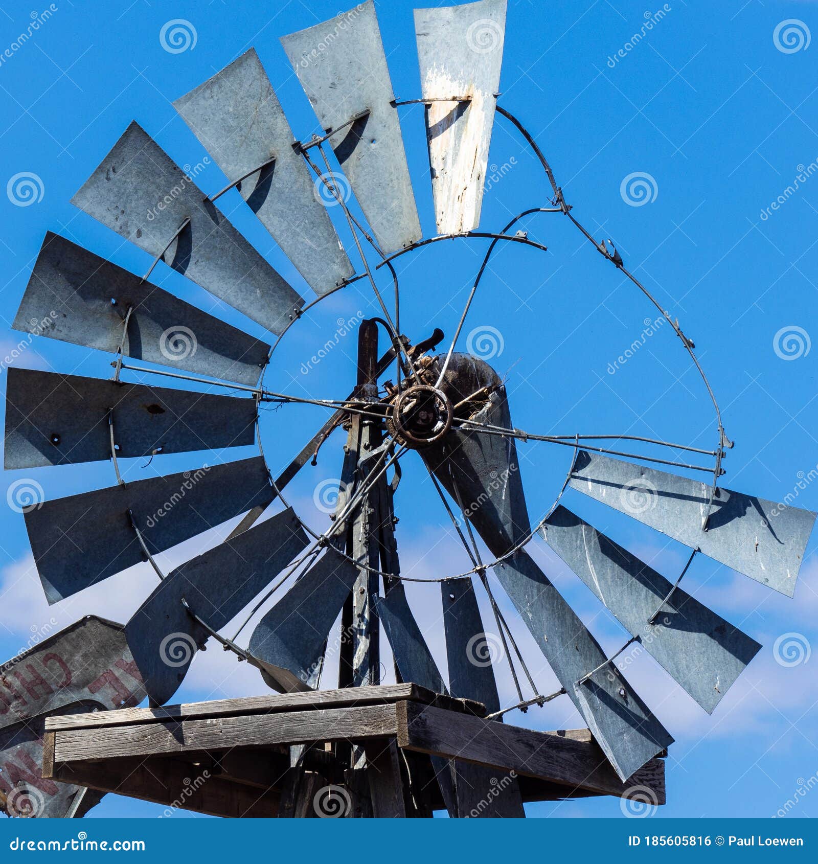 Broken Windmill Against a Blue Sky Stock Photo - Image of wing, tower ...