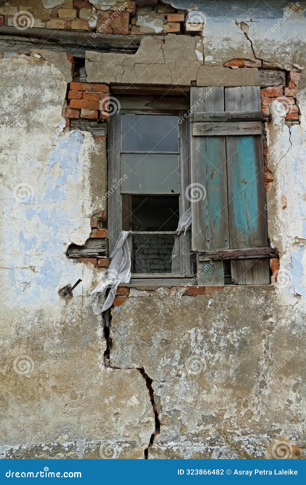 Broken Window with Dilapidated Shutter and a Dilapidated, Crumbling ...