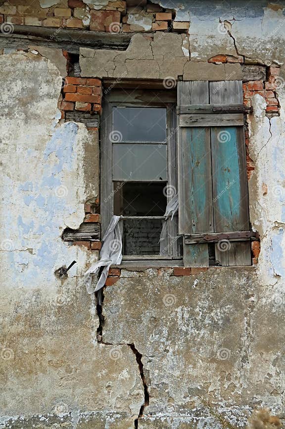 Broken Window with Dilapidated Shutter and a Dilapidated, Crumbling ...