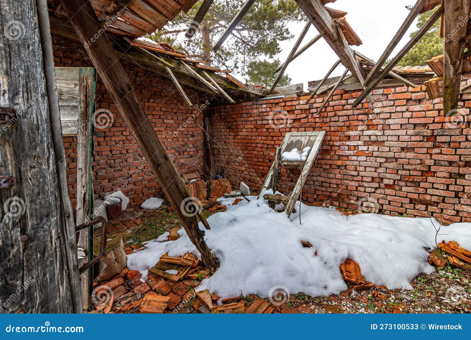 Broken Window is Visible Leaning Against a Brick Wall of a Ruined ...
