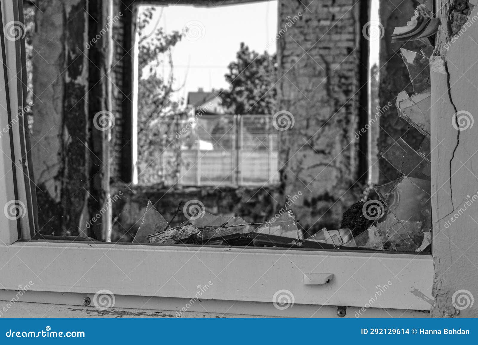 Broken Windows in a Burned-out School during Hostilities in the City of ...
