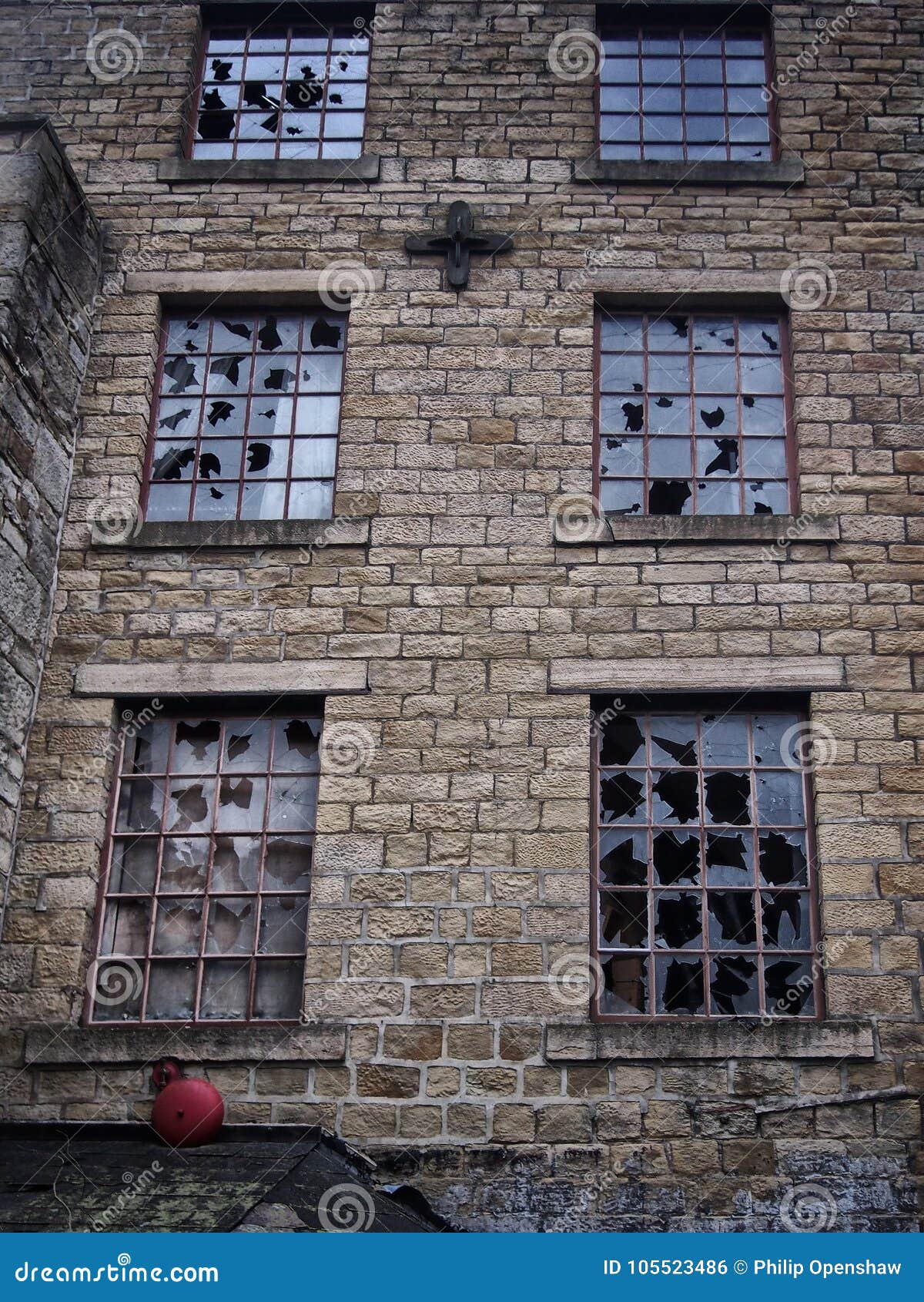 Broken Windows in an Empty Abandoned Vandalised Old Stone Building ...